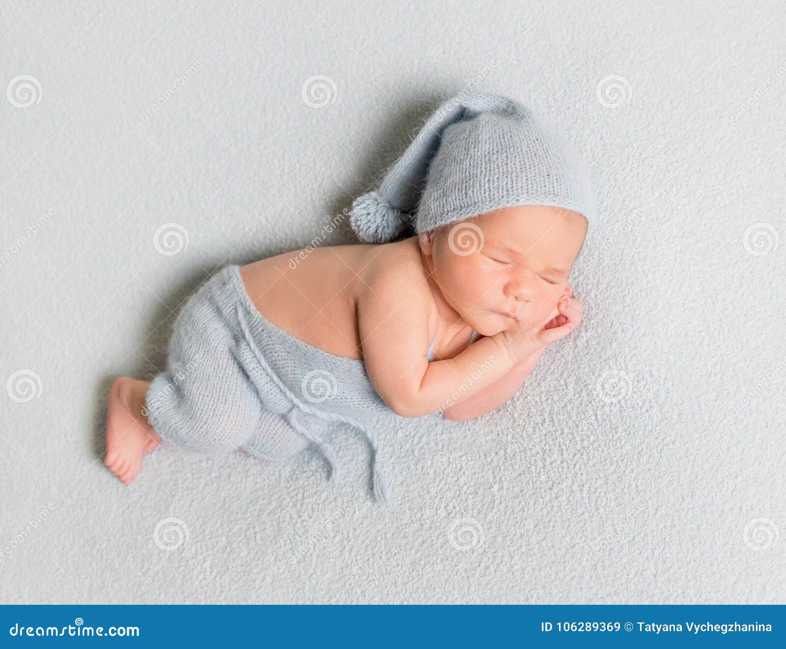 Baby Boy Curled Up on White Blanket Stock Image - Image of human, cozy ...