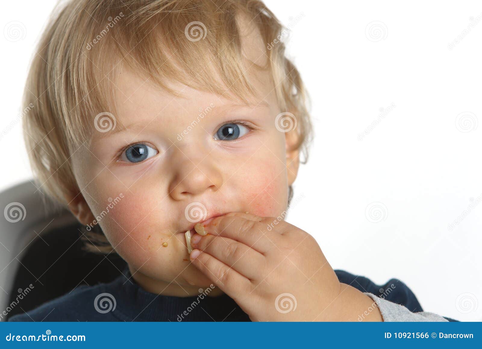 Baby boy eating portrait stock photo. Image of white - 10921566