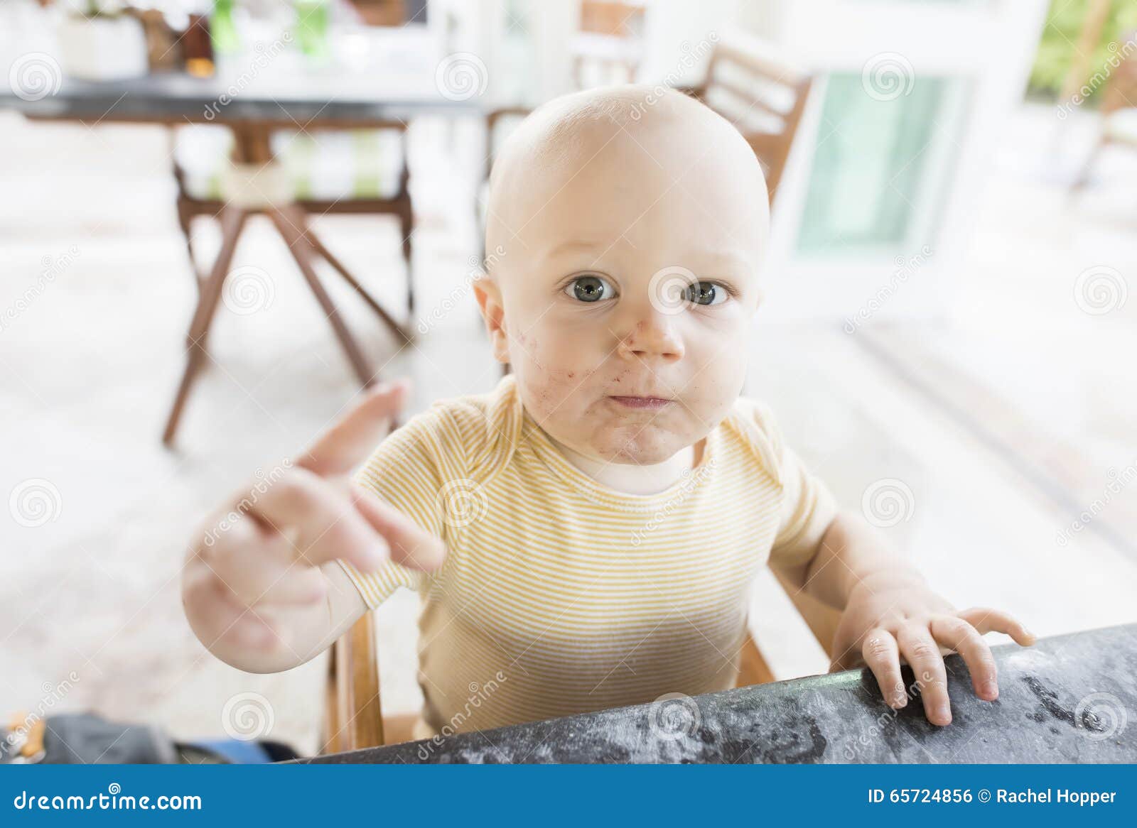 Baby Boy Eats Breakfast while on Vacation in Mexico Stock Photo - Image ...