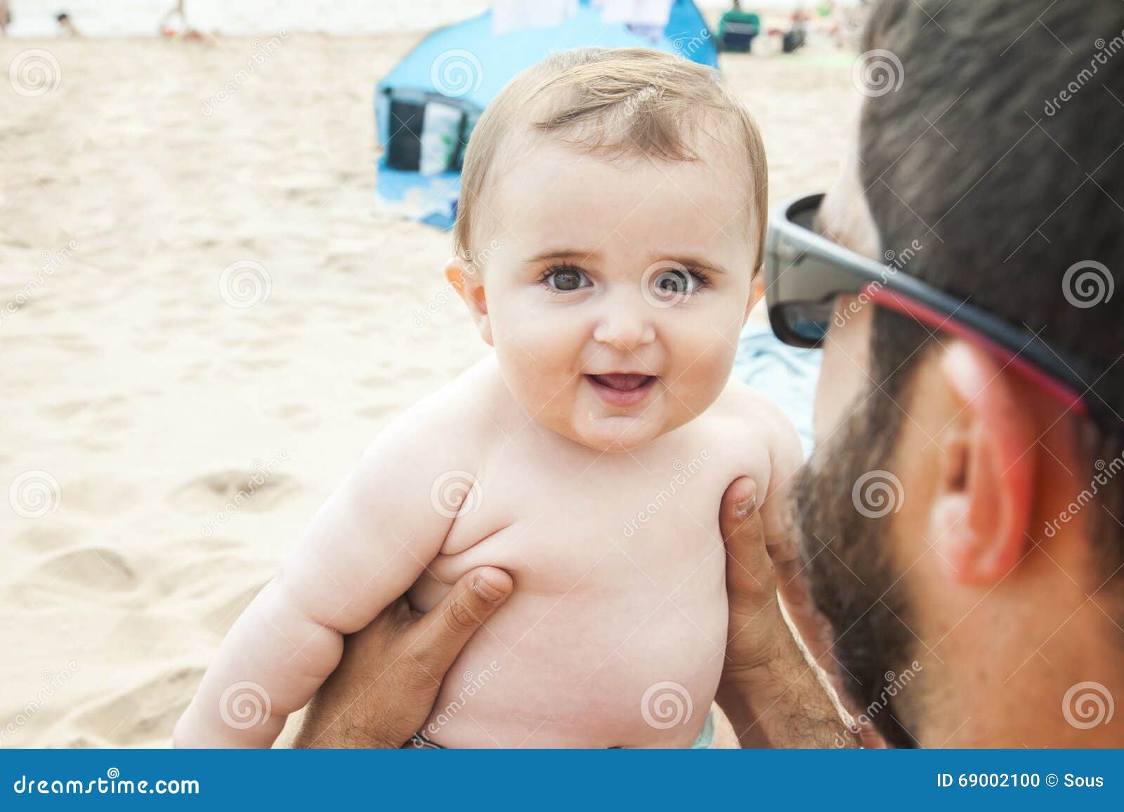 Baby Boy First Day in the Beach Stock Photo - Image of hold, lifestyle ...