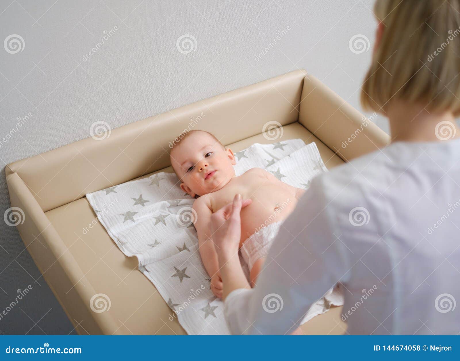 Baby Boy Getting a Massage from Masseuse Stock Photo - Image of ...