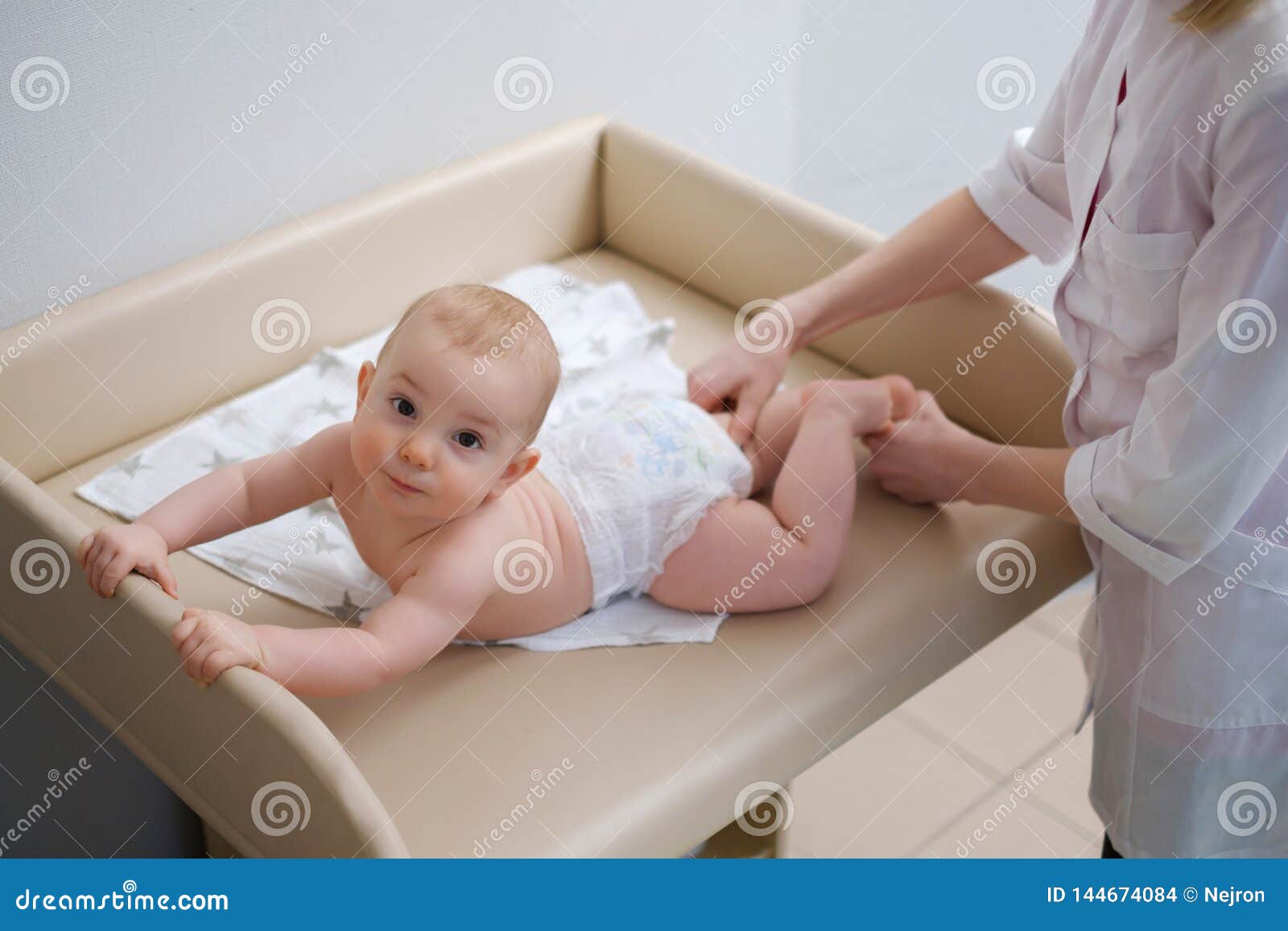Baby Boy Getting a Massage from Masseuse Stock Photo - Image of mother ...