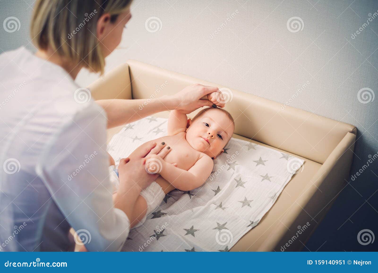 Baby Boy Getting a Massage from Masseuse Stock Image - Image of laying ...