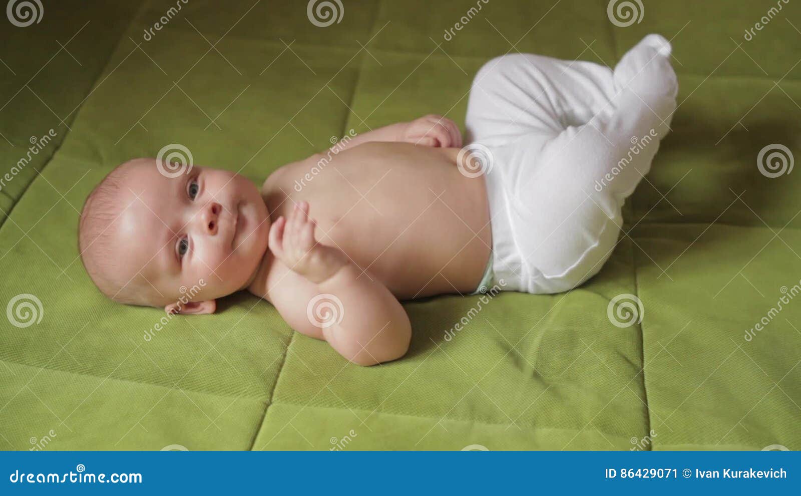 Baby Boy is Laid on His Back Smiling into the Camera. Stock Video ...