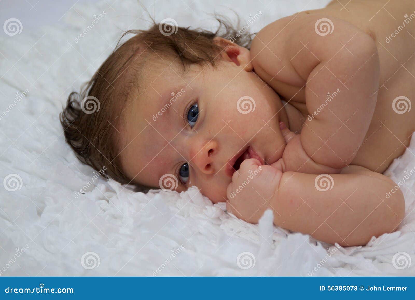 Baby Boy Laying on Side stock photo. Image of eyes, little - 56385078