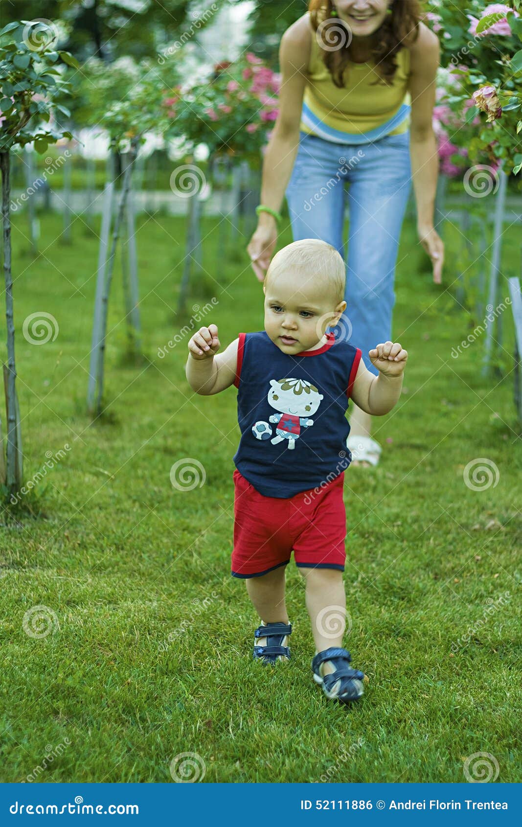 Baby boy learning to walk stock photo. Image of love - 52111886