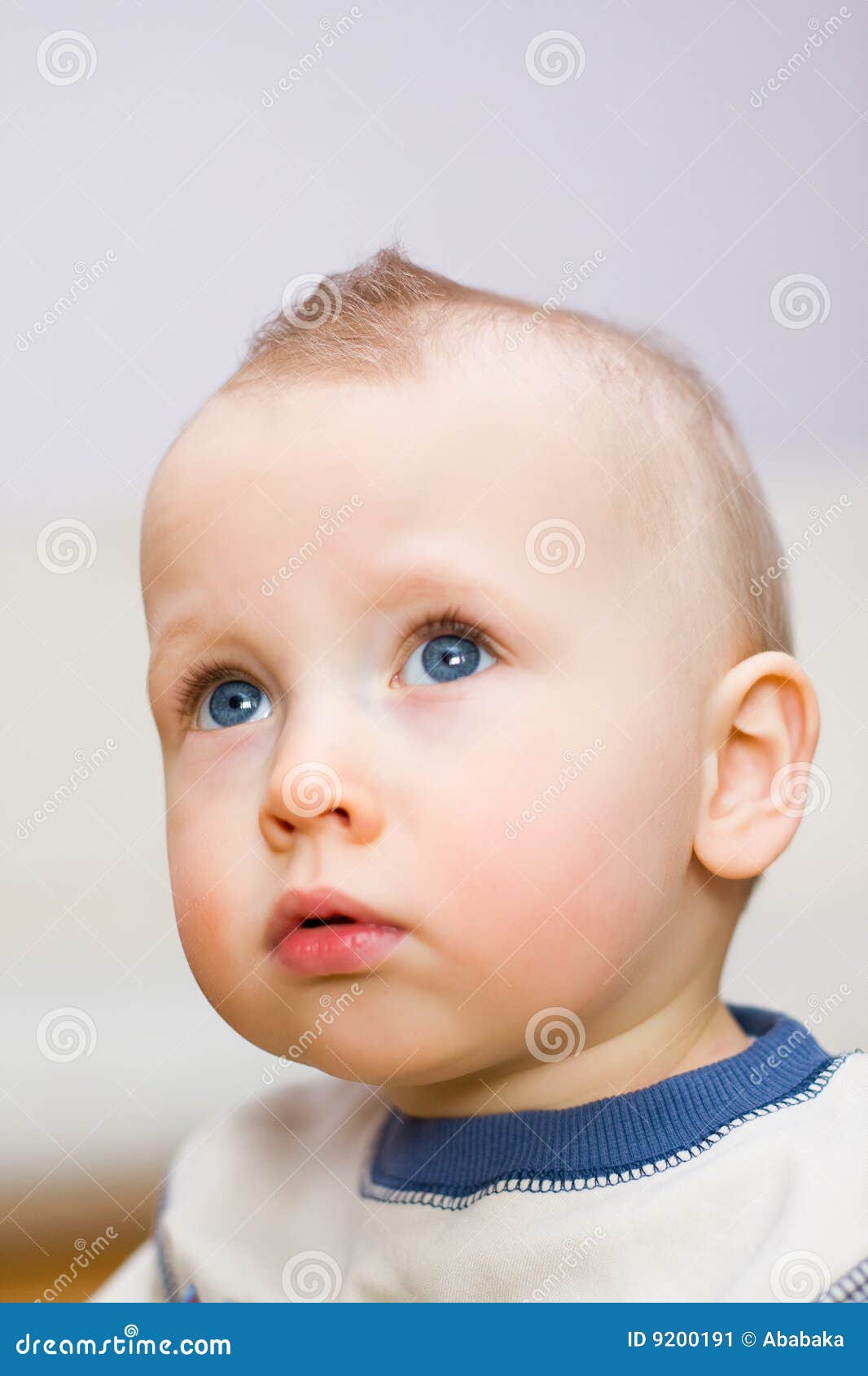 Baby boy looks up stock image. Image of camera, head, childhood - 9200191