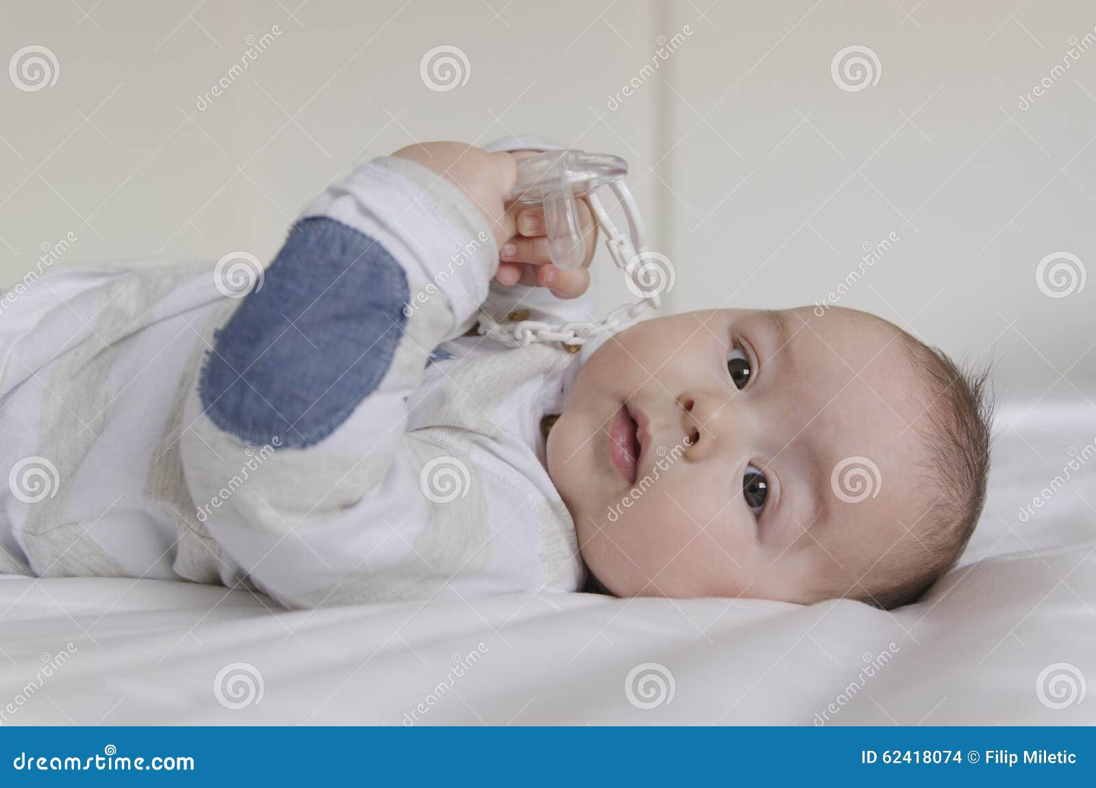 Baby boy lying on back stock photo. Image of blue, little - 62418074