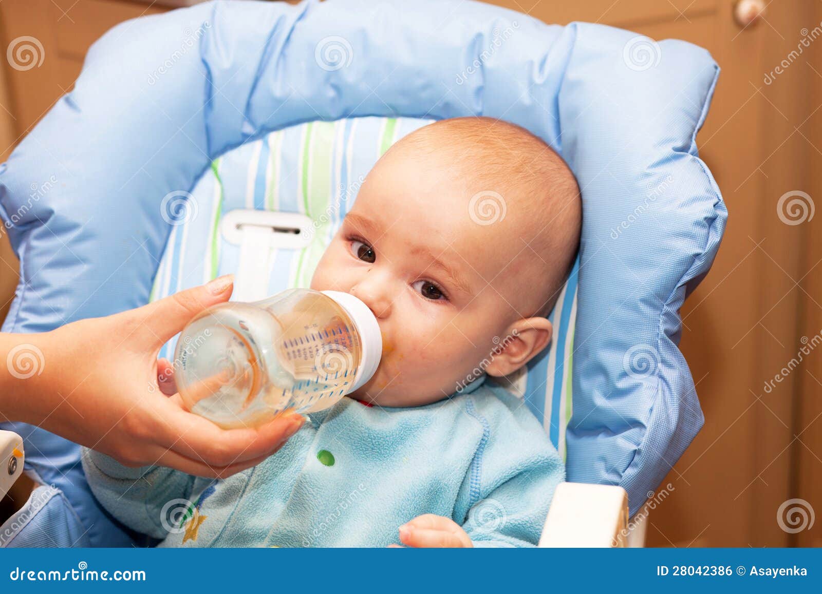 Baby Boy while Mother Feeding Stock Photo - Image of childhood, family ...