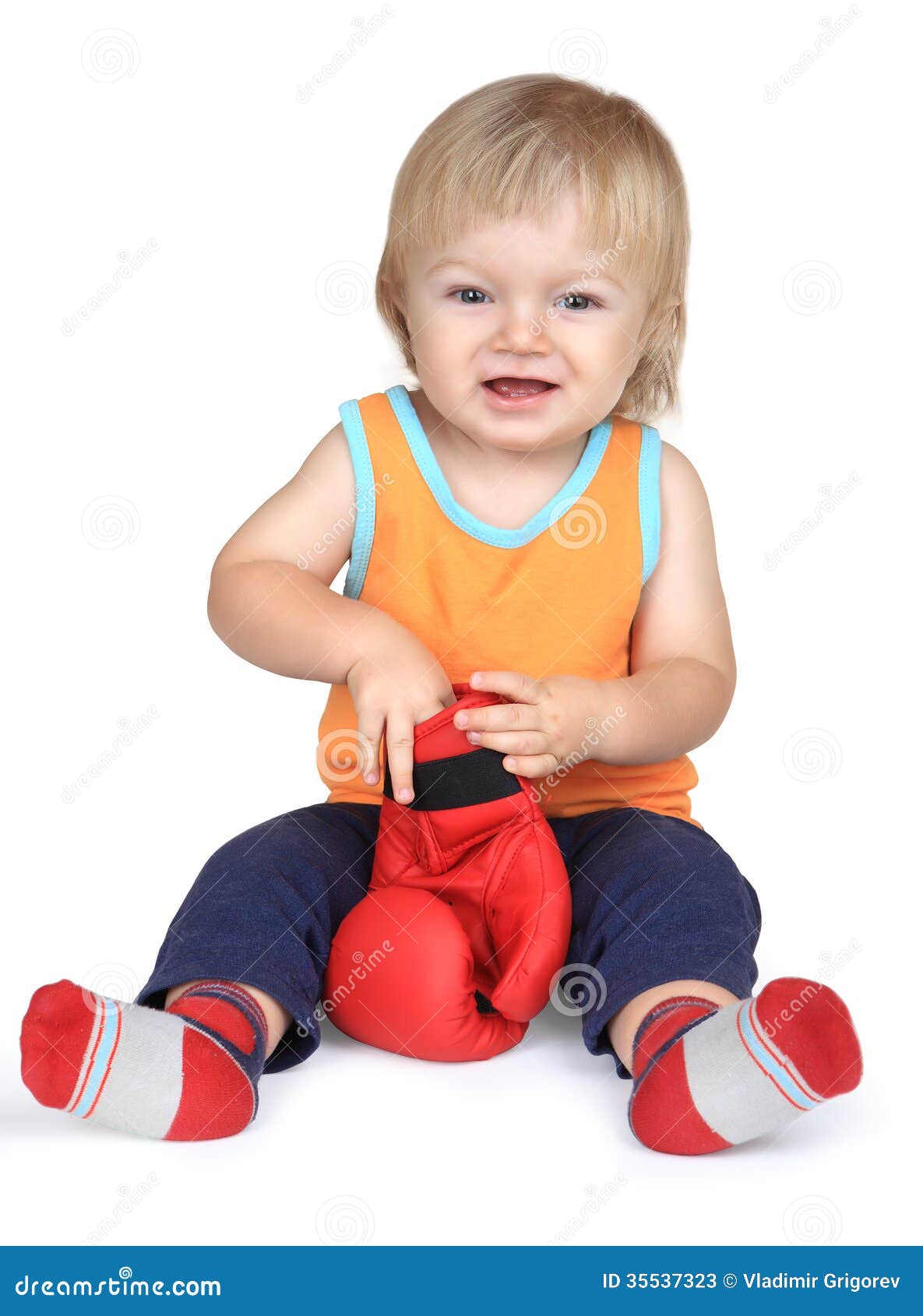 Baby Boy in Orange, Sitting with Red Boxing Gloves. Stock Image - Image ... Baby Boy in Orange, Sitting with Red Boxing Gloves. Stock Image - Image ...