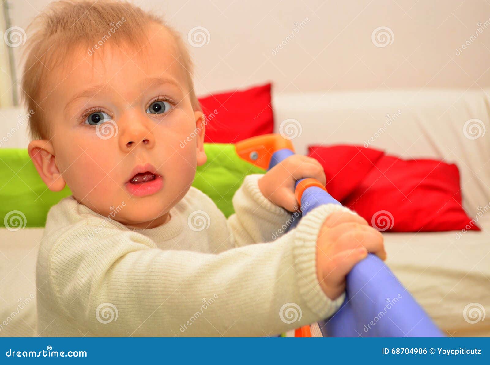Baby boy in play pen stock photo. Image of book, crib - 68704906