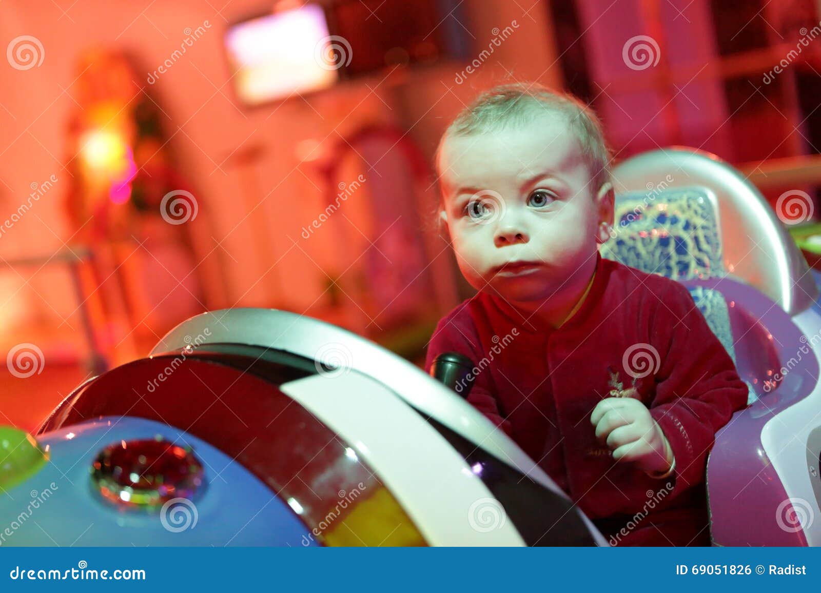 Baby Boy Playing Arcade Game Machine Stock Photo - Image of face ...