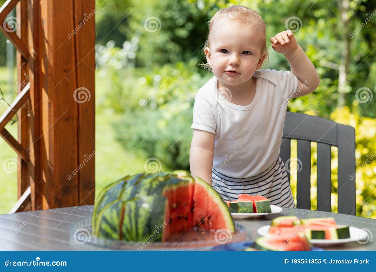 Baby Boy is Posing with Watermelon Lying on the Table Stock Image ...
