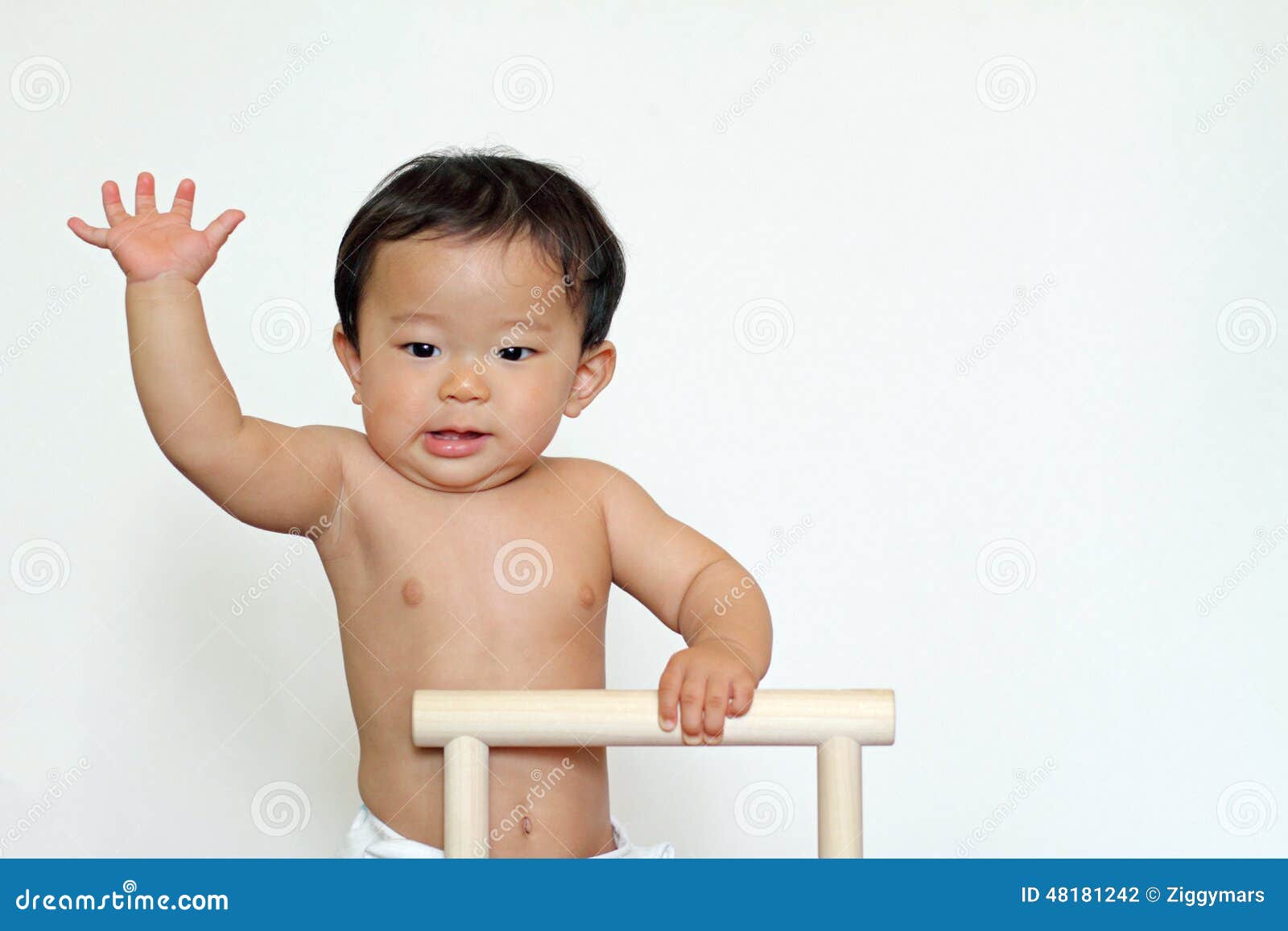 Baby boy pushing a cart stock photo. Image of walking - 48181242