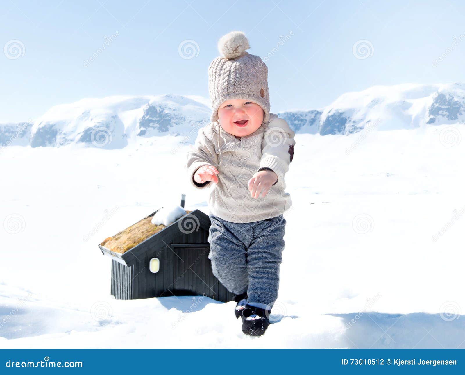Baby boy in the snow stock photo. Image of person, cute - 73010512