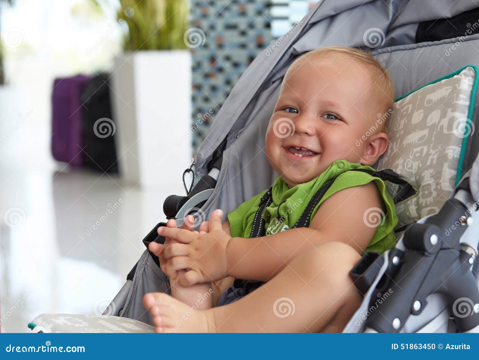 Baby boy in a stroller stock photo. Image of beautiful - 51863450
