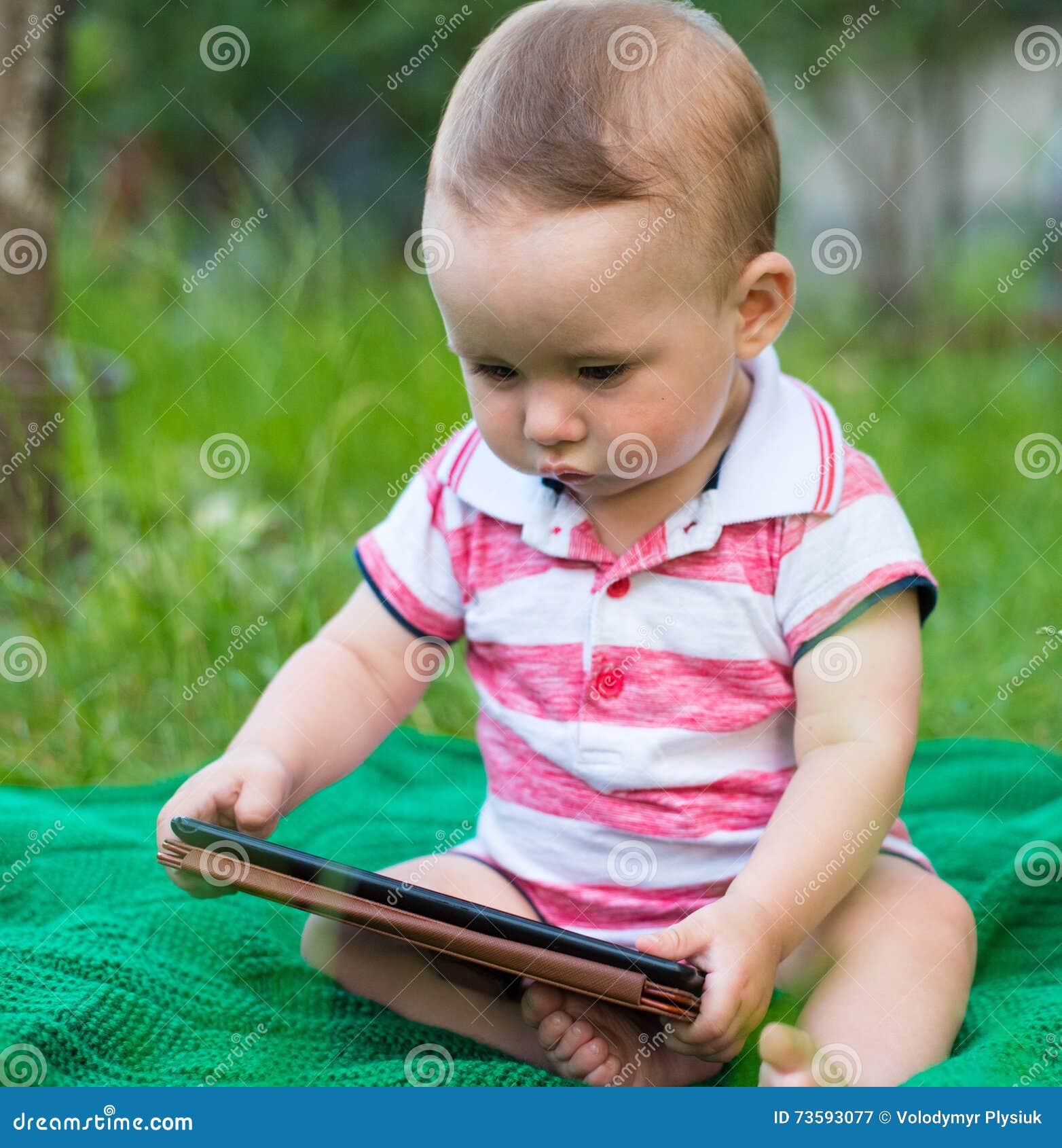 Baby boy with tablet stock image. Image of education - 73593077