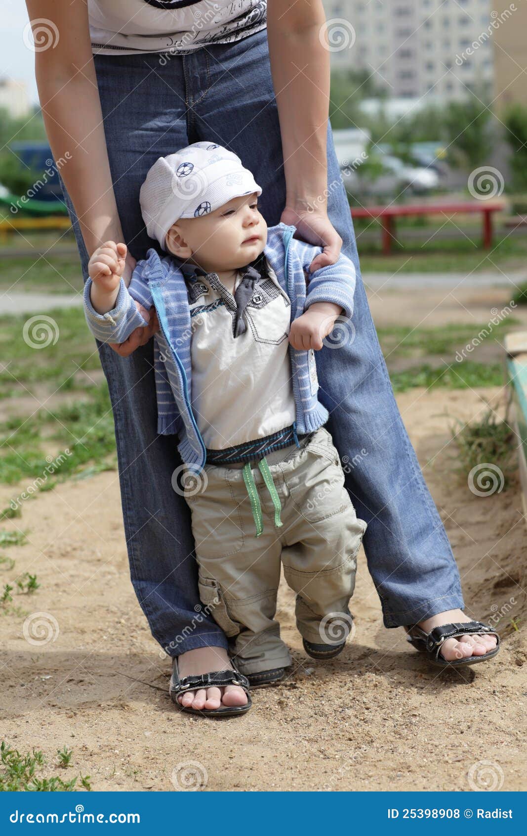 Baby boy takes first steps stock photo. Image of offspring - 25398908