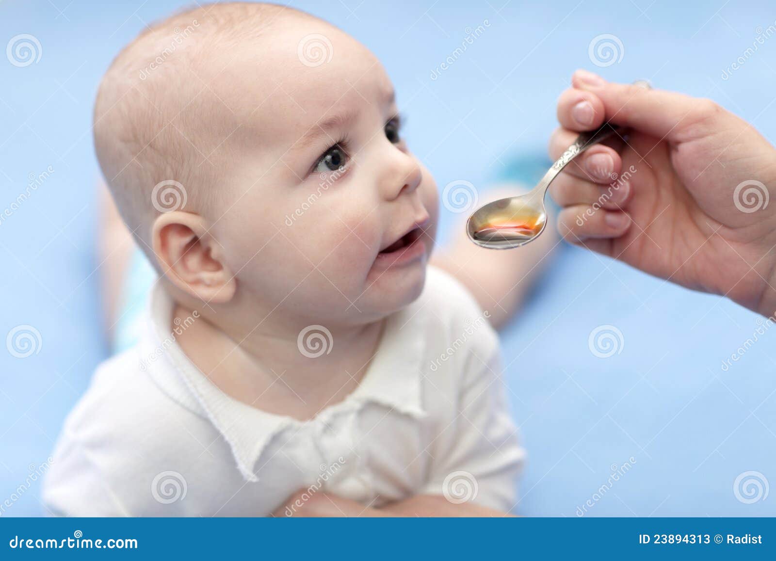 Baby boy taking medicine stock image. Image of eating - 23894313