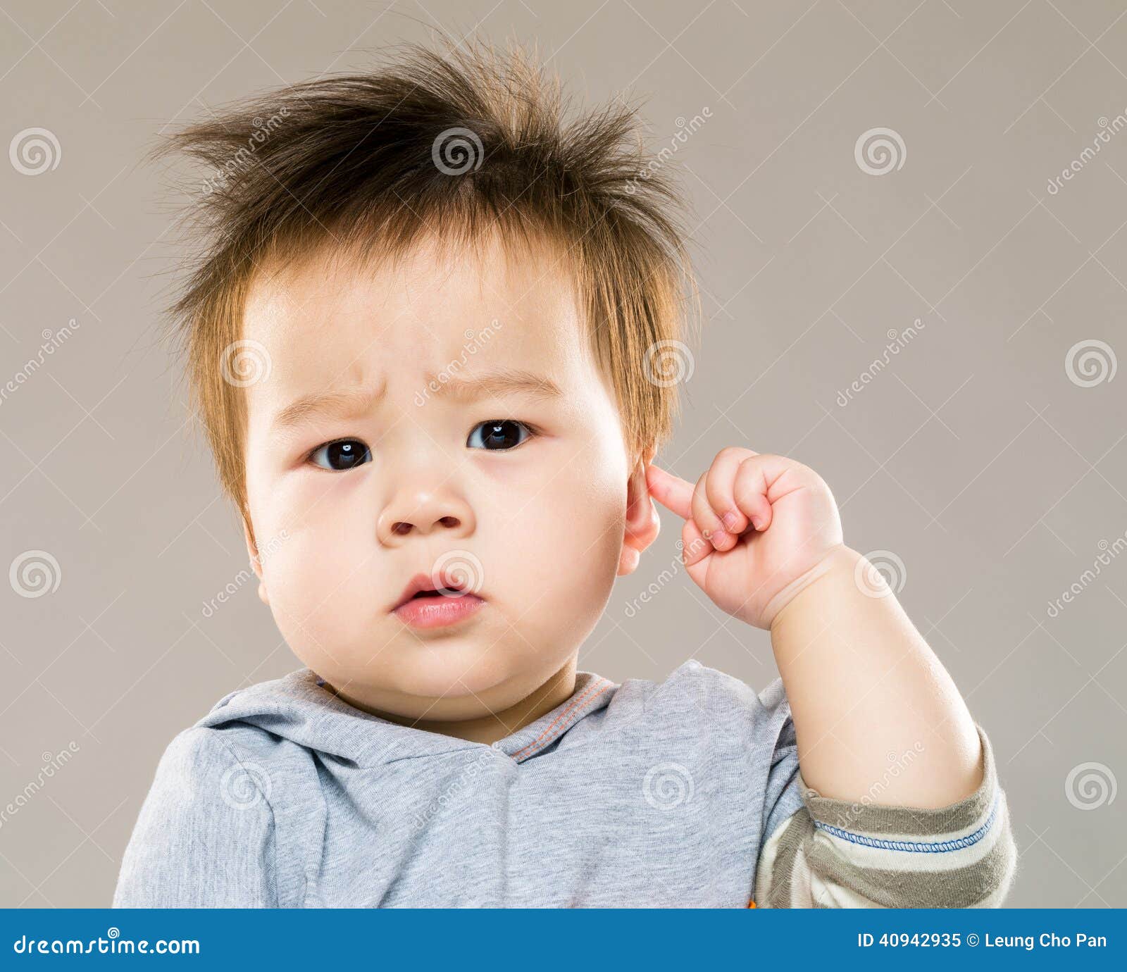 Baby boy touch his ear stock image. Image of baby, childhood - 40942935