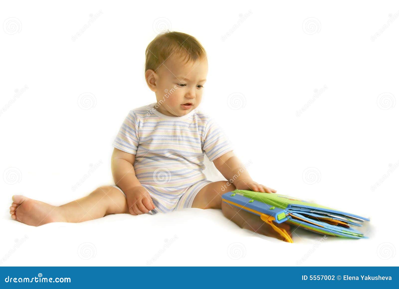 Baby boy with toy-book stock photo. Image of play, baby - 5557002