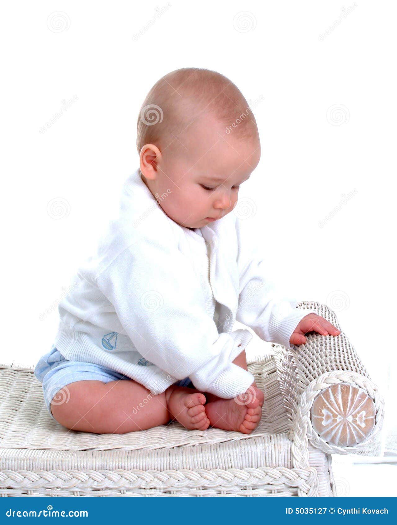 Baby Boy on Wicker Bench stock image. Image of pleasant - 5035127