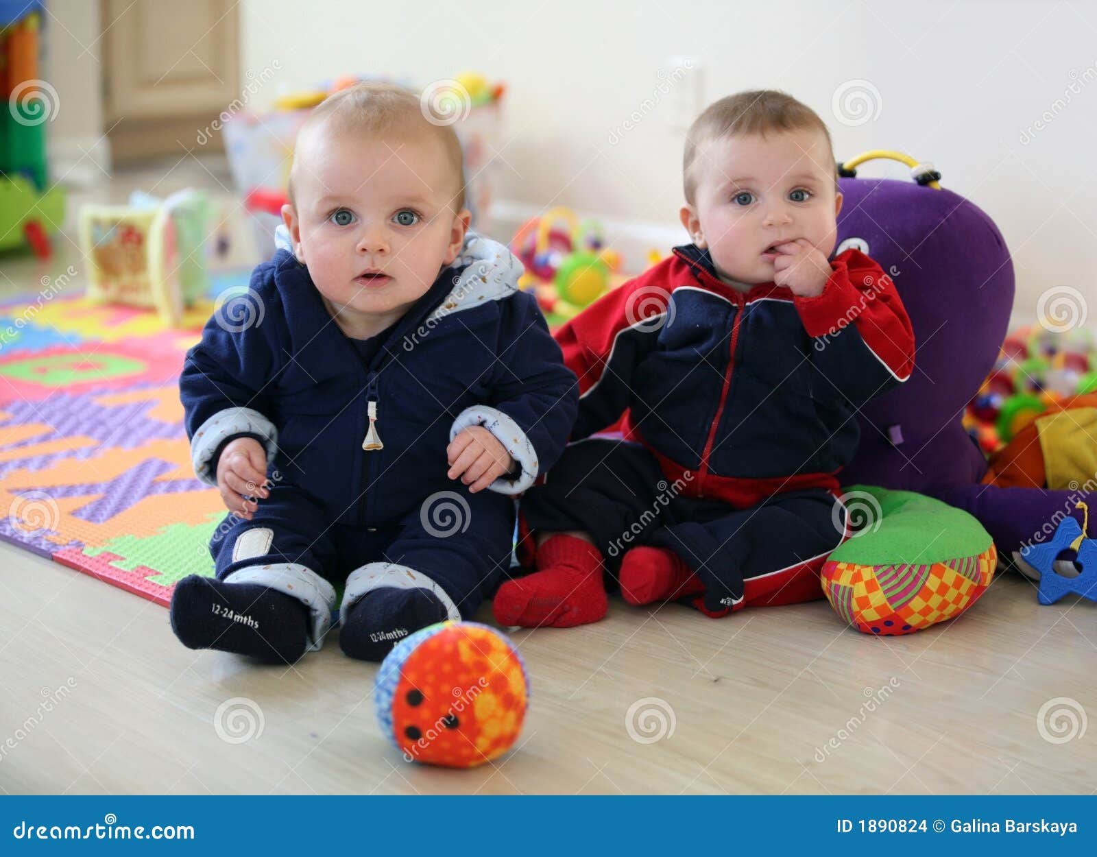 Baby brothers playing stock photo. Image of infant, babies - 1890824