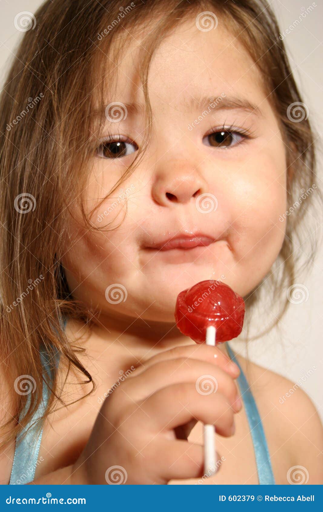 Baby with Candy stock image. Image of suck, lolly, toddler - 602379