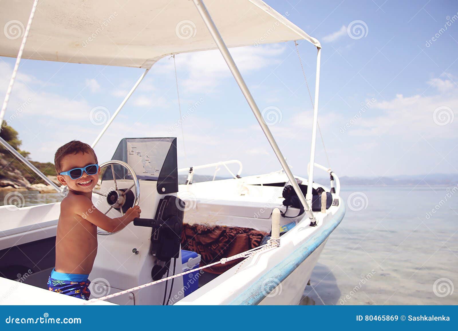 Baby captain on yacht stock image. Image of ship, leisure - 80465869