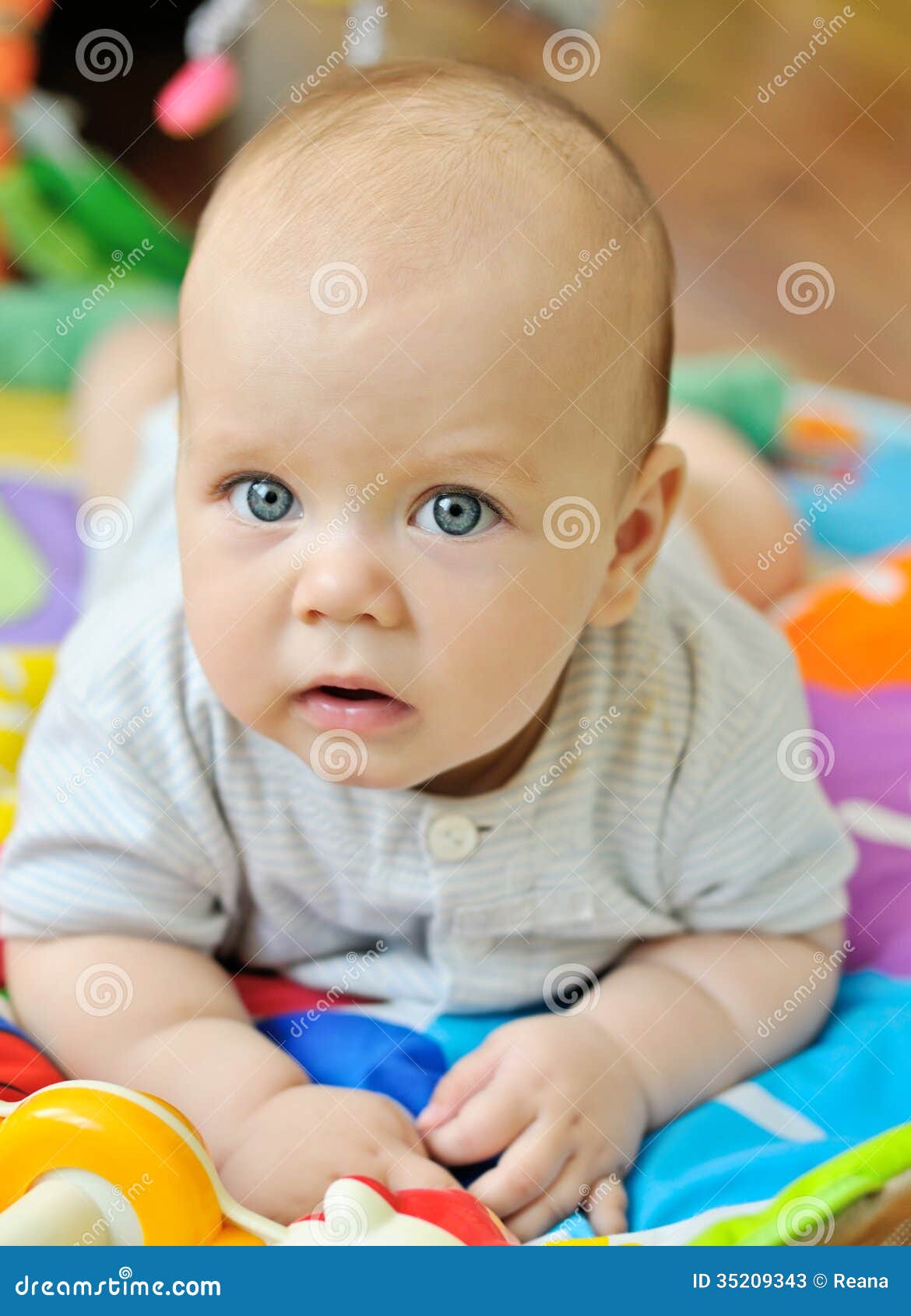 Baby on the carpet stock image. Image of object, lifestyle - 35209343
