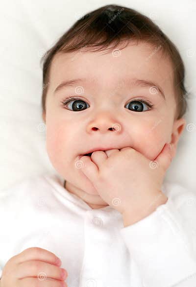 Baby chewing fingers stock image. Image of infant, adorable - 24725609