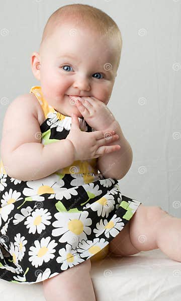 Baby chewing on hand. stock image. Image of little, cute - 5807759