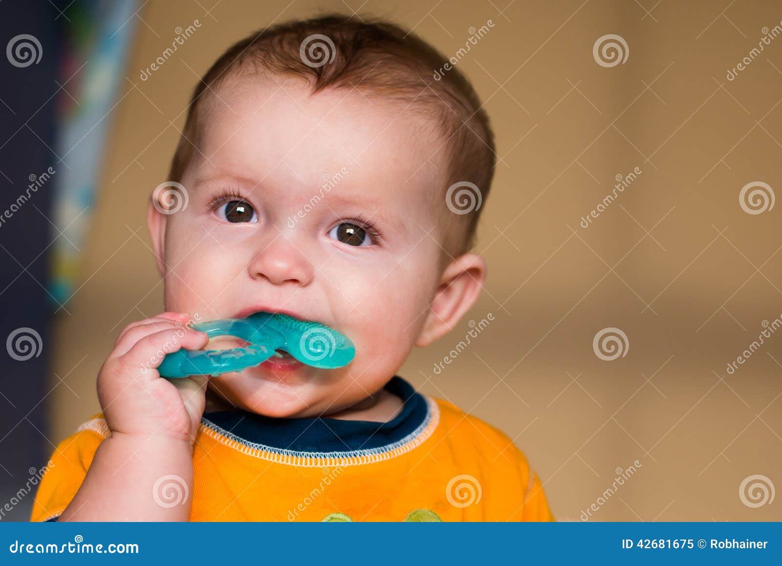 Baby Chewing on Teething Ring Stock Image - Image of play, tiny: 42681675