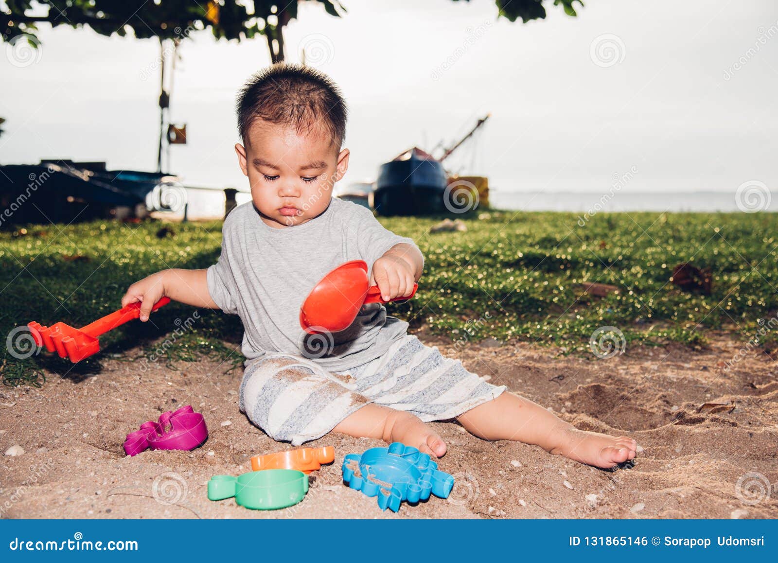 Baby child playing sand stock photo. Image of baby, leisure - 131865146