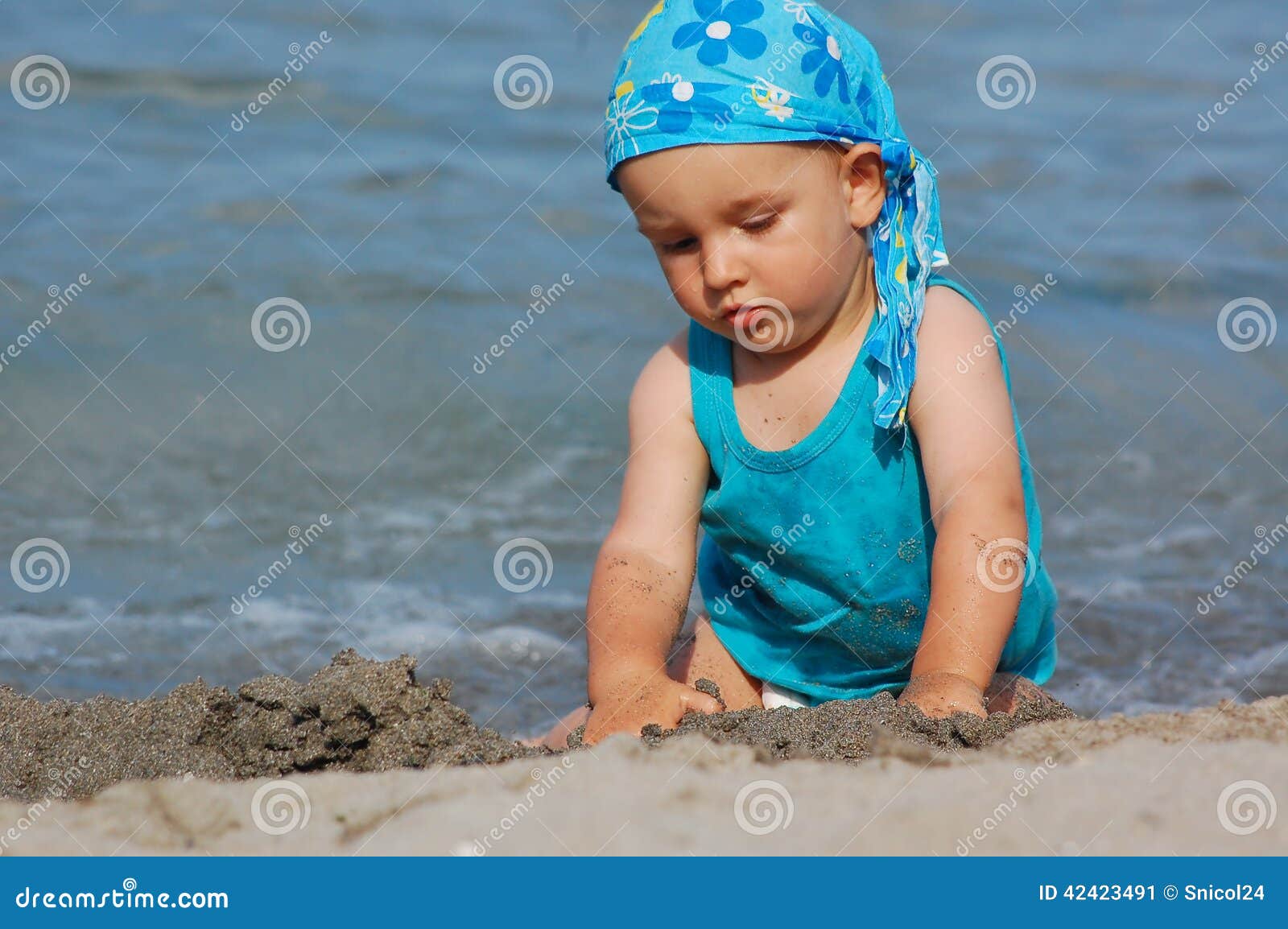 Baby Child Playing in Waves Stock Image - Image of blue, playing: 42423491