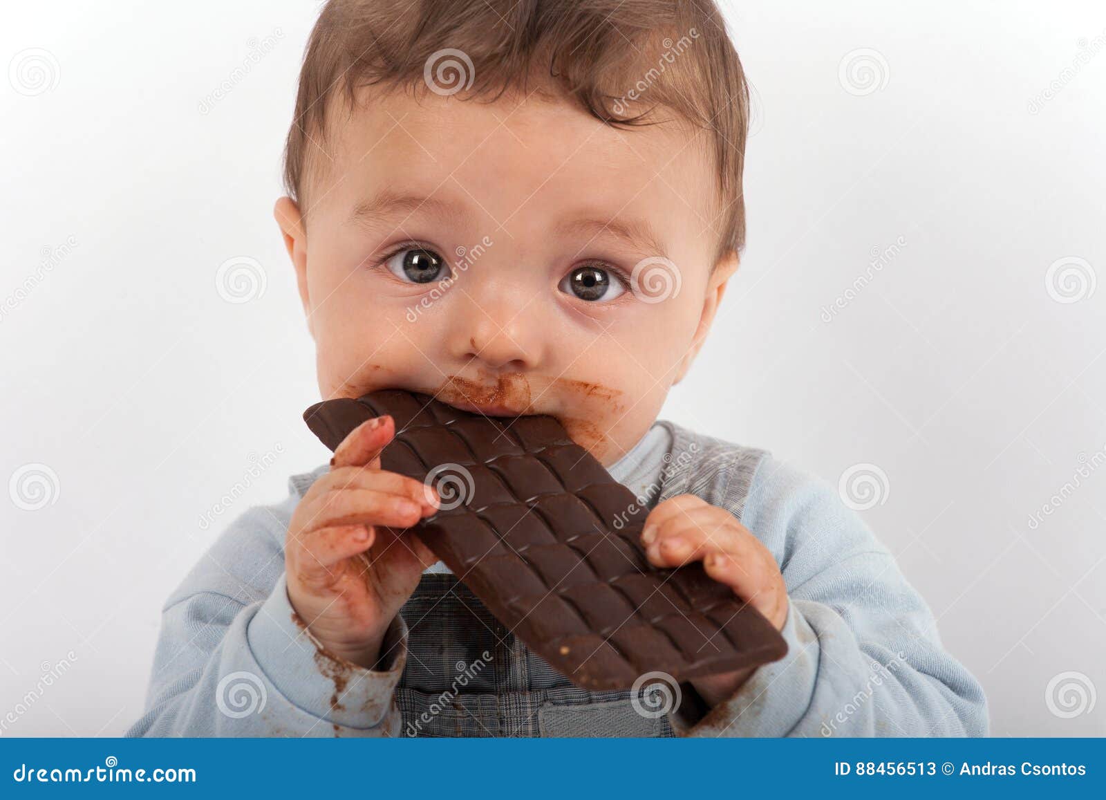 Baby with chocolate stock image. Image of smile, face - 88456513