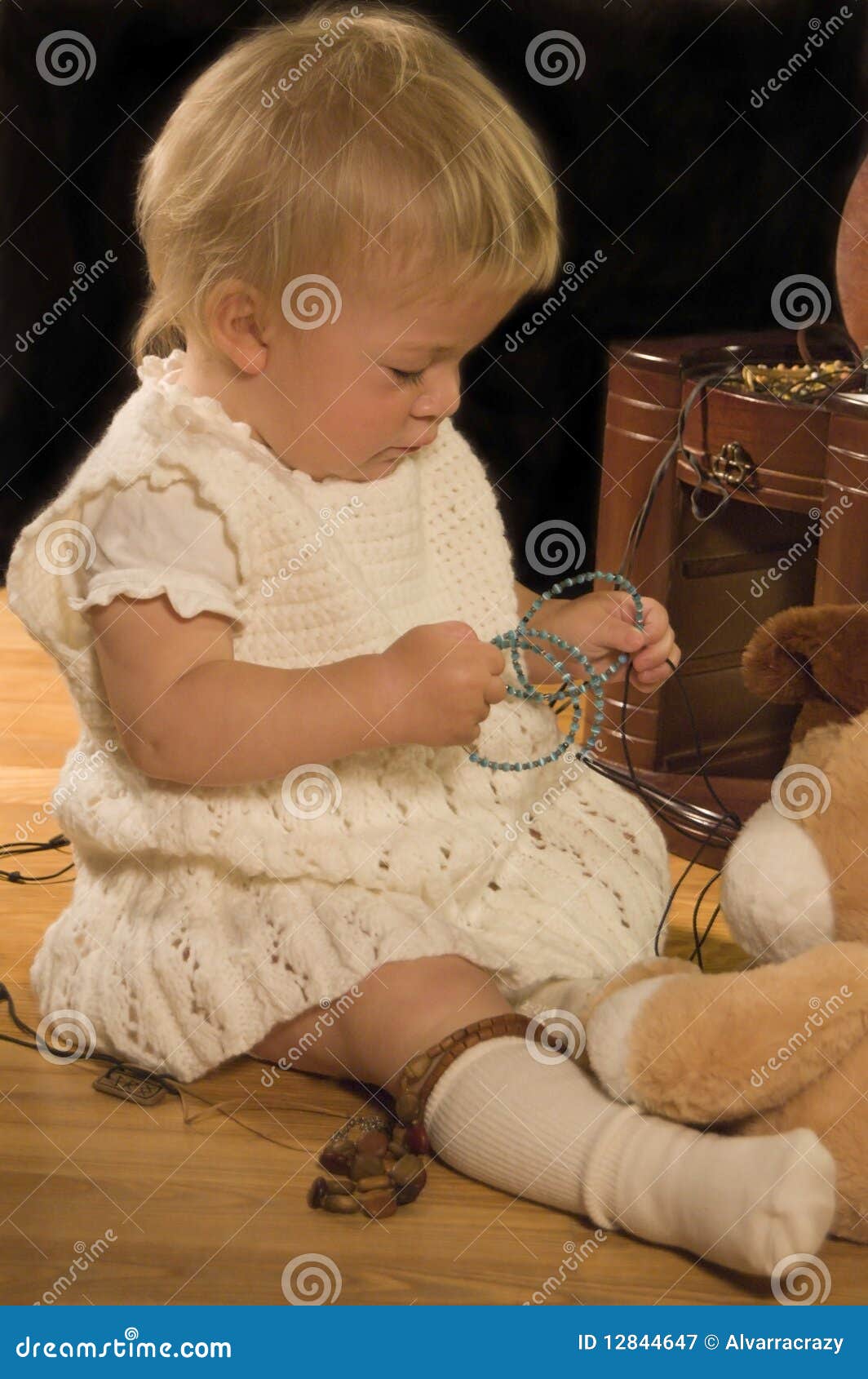 Baby choosing accessory stock image. Image of accessory - 12844647