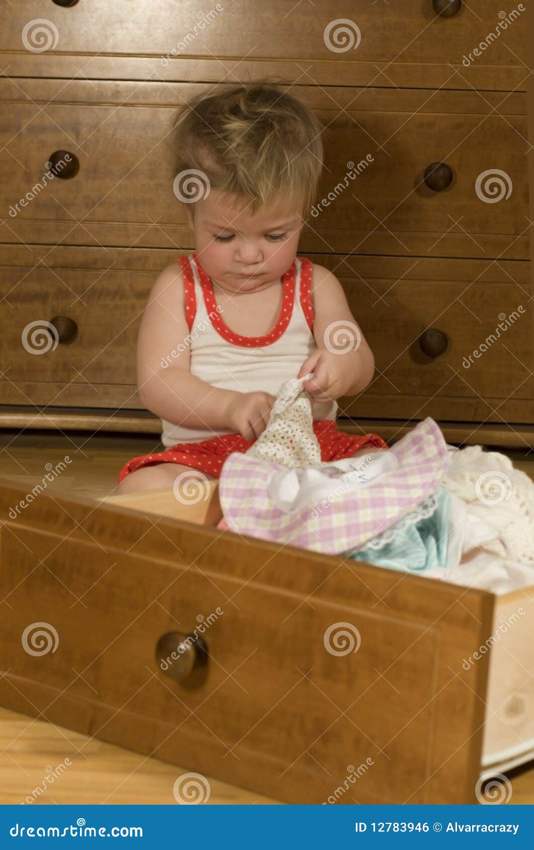 Baby choosing a hat stock photo. Image of apparel, girl - 12783946