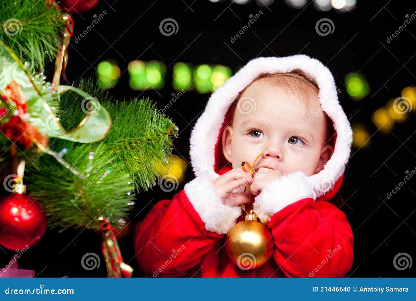 Baby beside Christmas tree stock photo. Image of holiday - 21446640