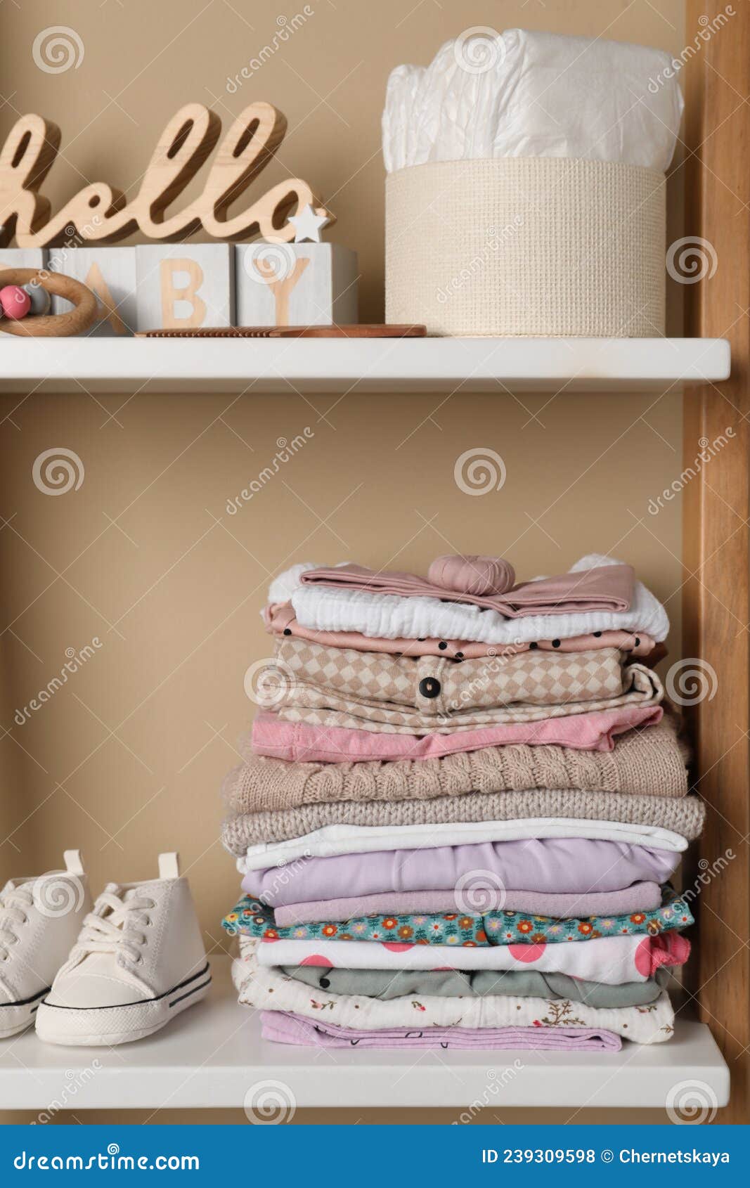 Baby Clothes and Accessories on Wooden Rack Stock Photo - Image of ...