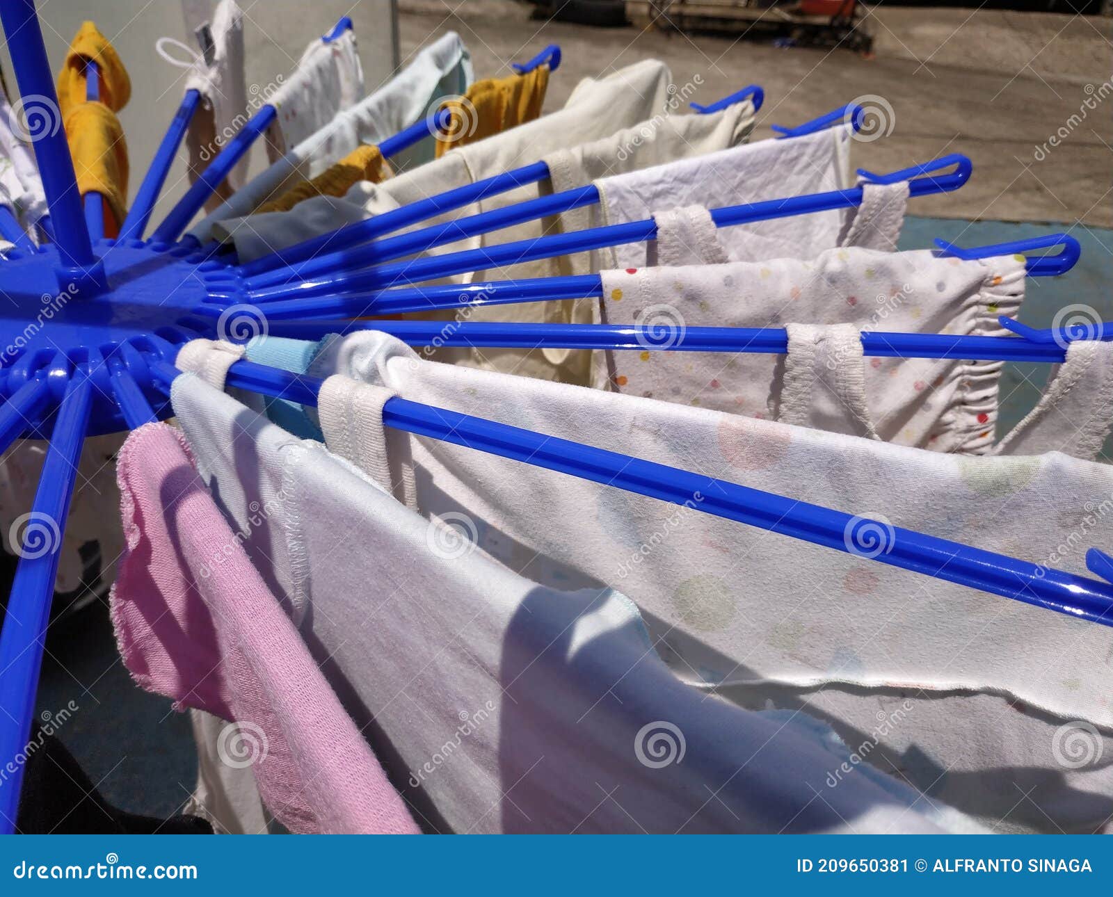 Baby Clothes that are Drying on a Hanger Stock Image - Image of clothes ...