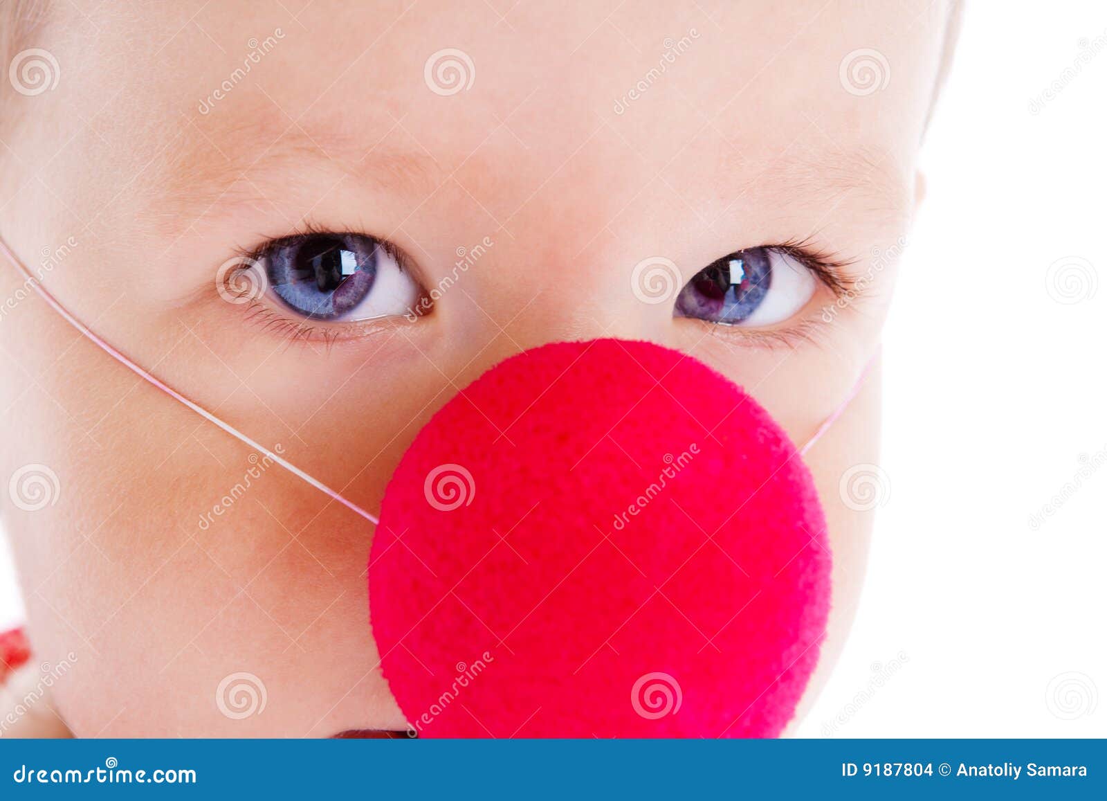 Baby with clown nose stock photo. Image of color, head - 9187804