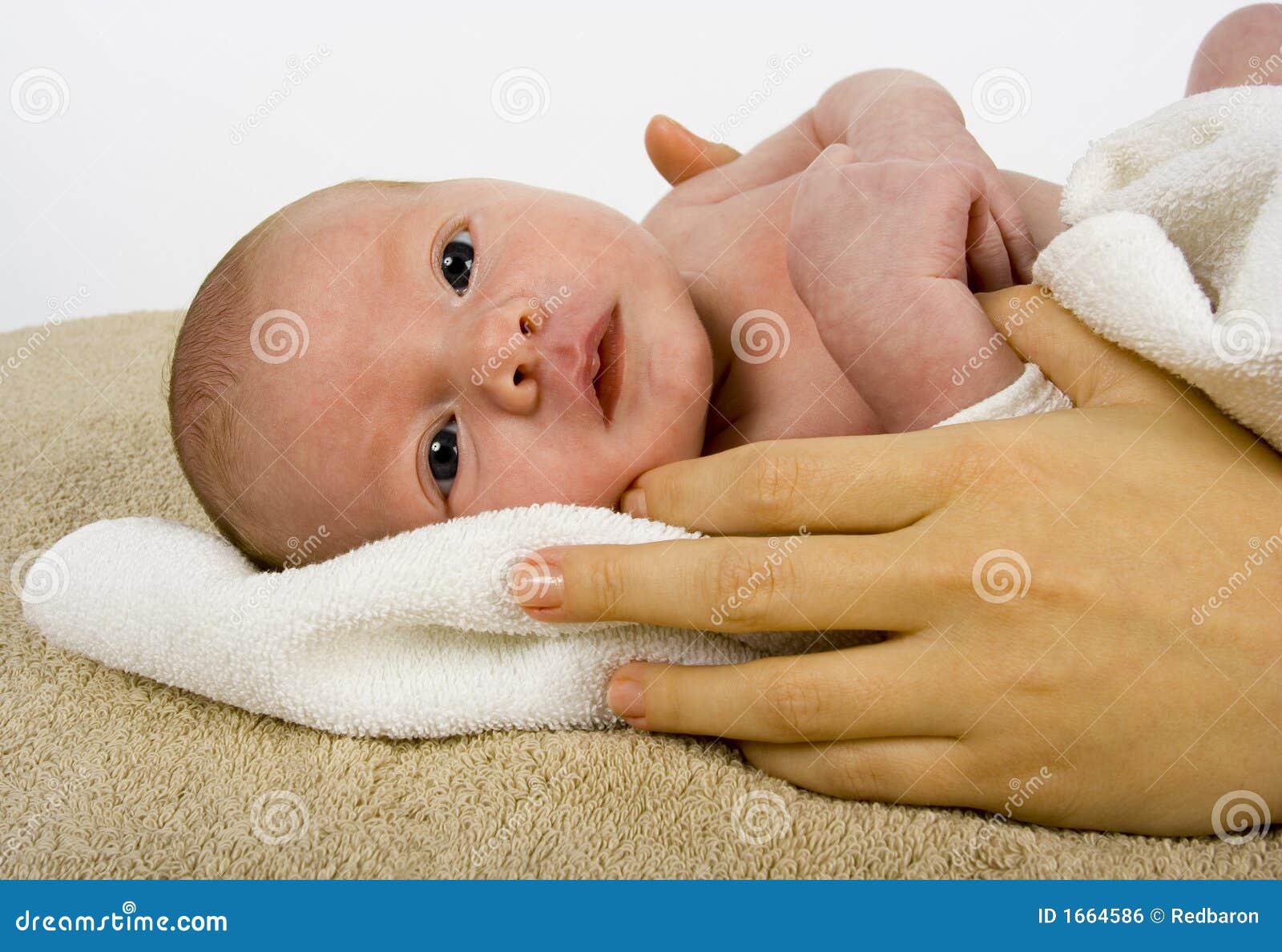 Baby cocooned in the towel stock photo. Image of bathing - 1664586