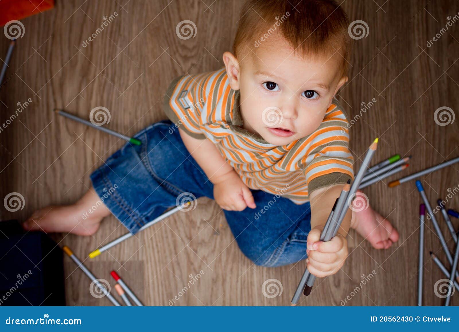 Baby with colorful pencils stock photo. Image of playful - 20562430
