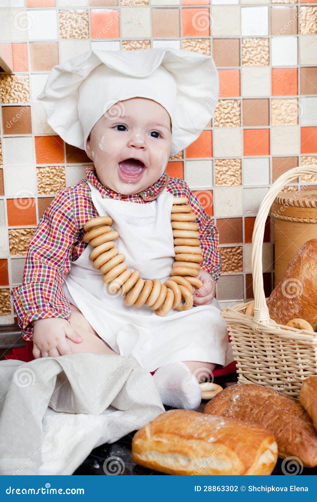 Baby cook with bread stock photo. Image of preparation - 28863302