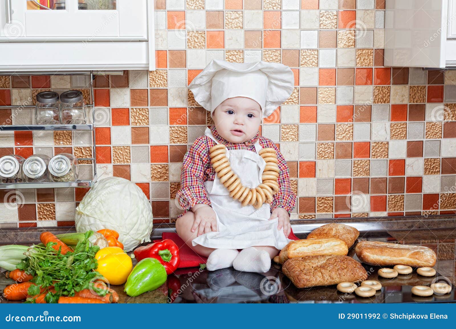 Baby cook with bread stock photo. Image of face, little - 29011992
