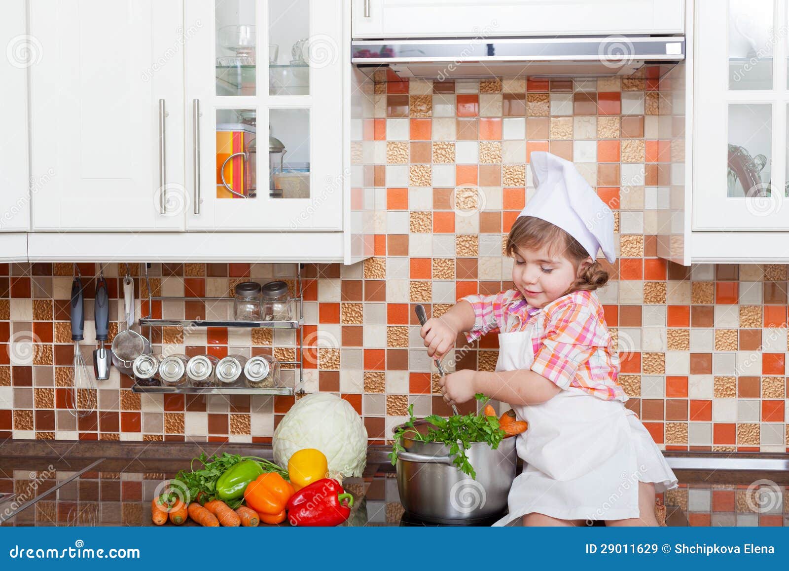 Baby cook with vegetables stock image. Image of preparation - 29011629