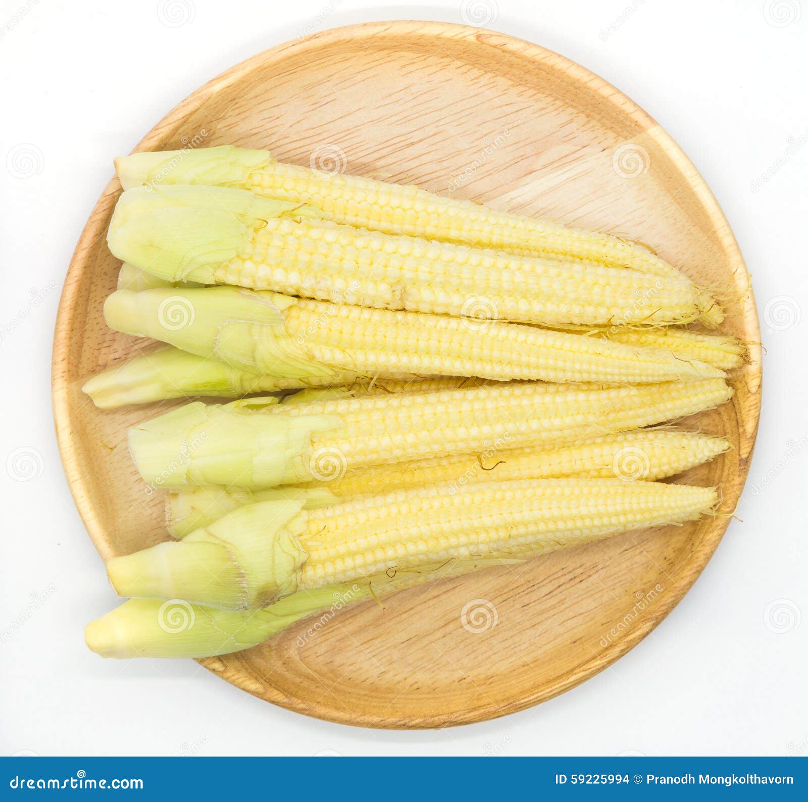 Baby corn on wooden plate stock photo. Image of cooking - 59225994