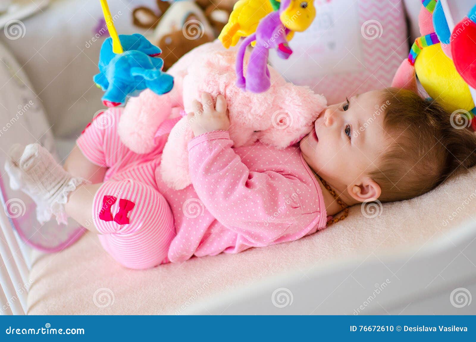 Baby in a cot stock photo. Image of beautiful, caucasian - 76672610