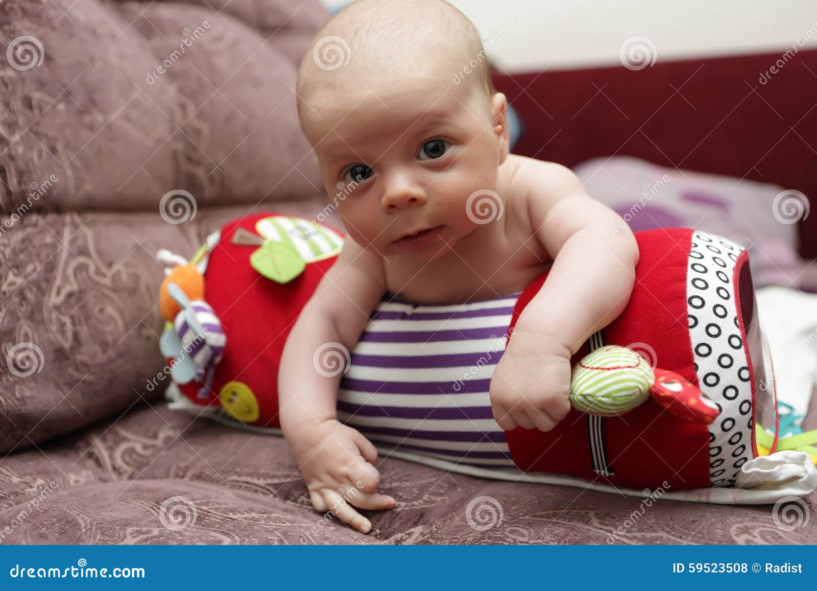 Baby on crawling roll stock photo. Image of beautiful - 59523508